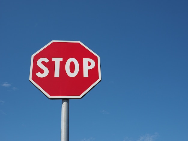 Premium Photo | Stop sign over blue sky Premium Photo | Stop sign over blue sky