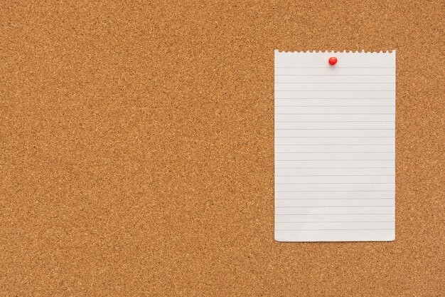 Premium Photo | Stripped note paper with push pin on cork board Premium Photo | Stripped note paper with push pin on cork board