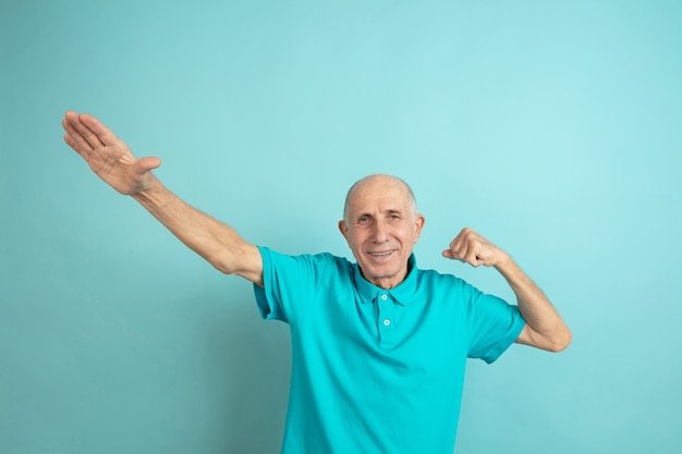 Free Photo | Success winner gesture. caucasian senior man's portrait on ... Free Photo | Success winner gesture. caucasian senior man's portrait on ...