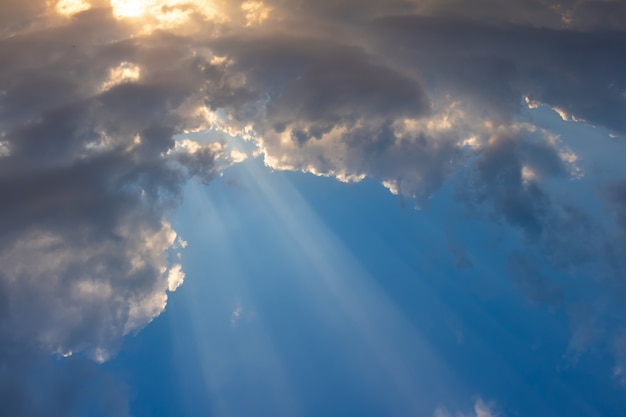 Premium Photo | The sun shines through the clouds Premium Photo | The sun shines through the clouds