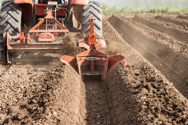 Premium Photo | Tractor preparation soil working in field agriculture. Premium Photo | Tractor preparation soil working in field agriculture.