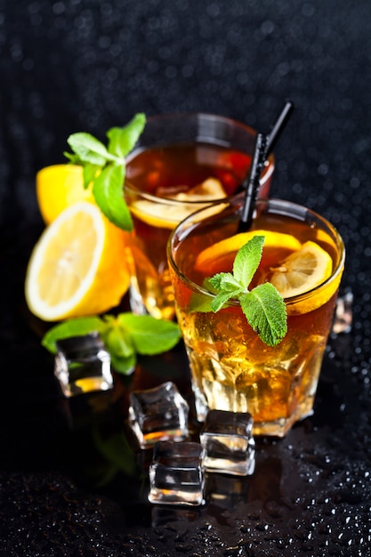 Premium Photo Two Glasses With Cold Traditional Iced Tea With Lemon