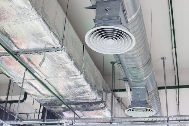 Ventilation and cooling ventilation system on the ceiling | Premium Photo Ventilation and cooling ventilation system on the ceiling | Premium Photo