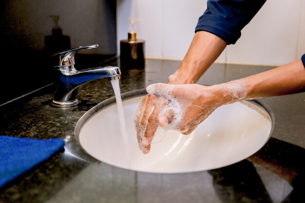 Premium Photo | Washing hands rubbing with soap Premium Photo | Washing hands rubbing with soap