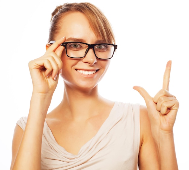 Premium Photo Woman Wearing Glasses Pointing Up Isolated On White