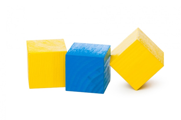 Premium Photo | Wooden building blocks isolated on white background Premium Photo | Wooden building blocks isolated on white background