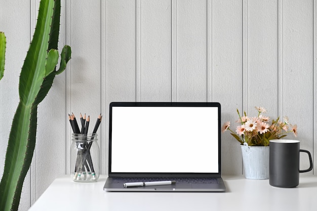 Premium Photo | Workspace with blank screen laptop. Premium Photo | Workspace with blank screen laptop.