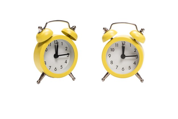 Premium Photo Yellow Alarm Clock Isolated On A White Background