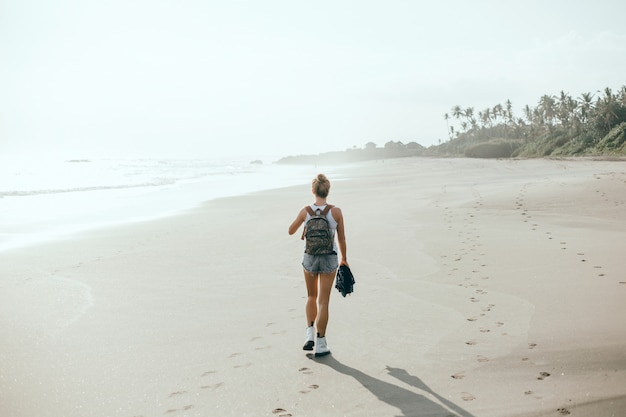 Free Photo Young Beautiful Girl Posing On The Beach Ocean Waves