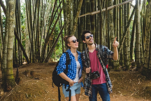 Free Photo | Young couple exploring forest Free Photo | Young couple exploring forest