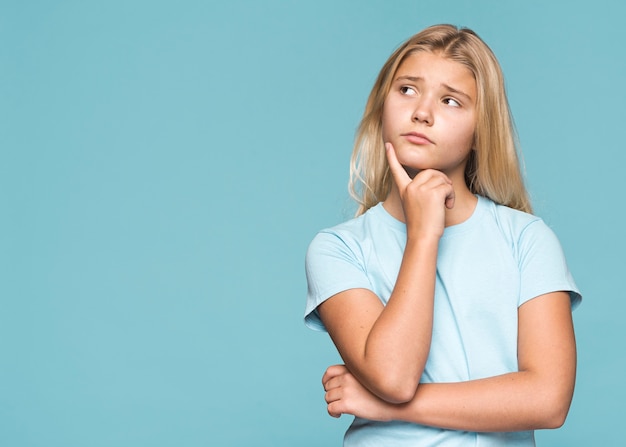 Premium Photo Young Girl Thinking With Copy Space