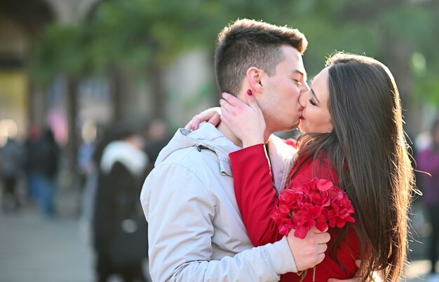 Premium Photo Young Lovely Couple Hugging And Kissing Outdoor