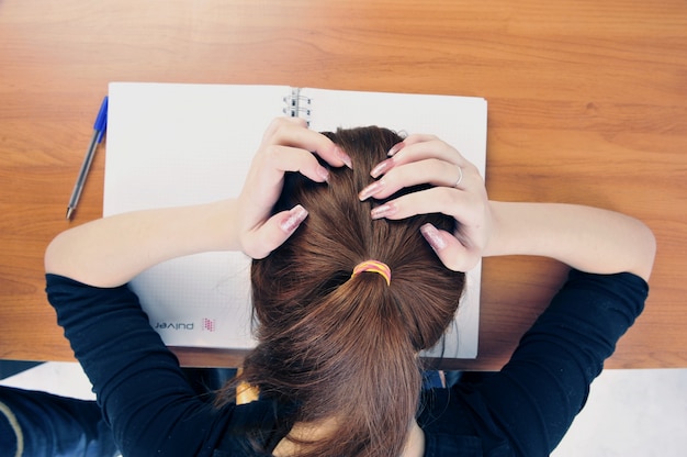 Premium Photo | Young student frustration while trying to study Premium Photo | Young student frustration while trying to study