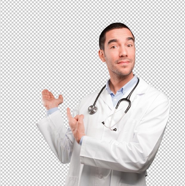 Premium PSD | Happy young doctor welcoming Premium PSD | Happy young doctor welcoming