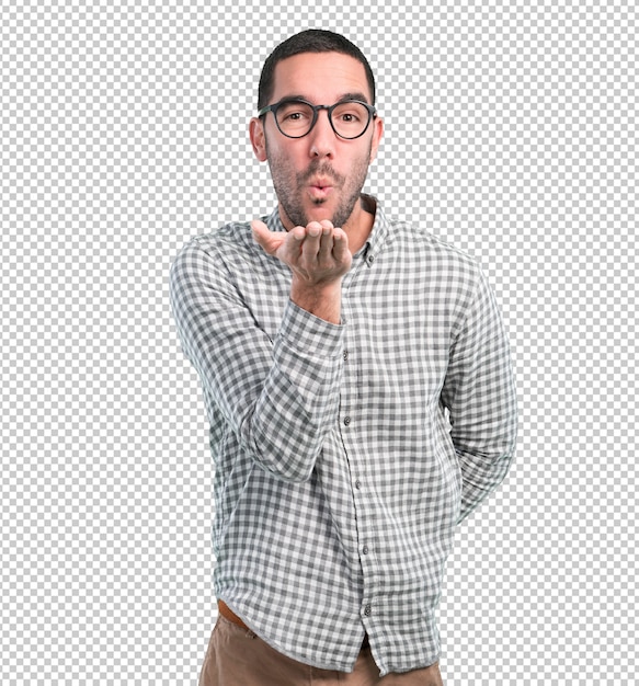 Premium PSD | Happy young man sending a kiss Premium PSD | Happy young man sending a kiss