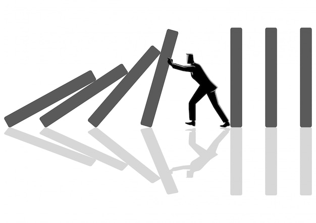 Premium Vector | Businessman trying to stop domino effect Premium Vector | Businessman trying to stop domino effect