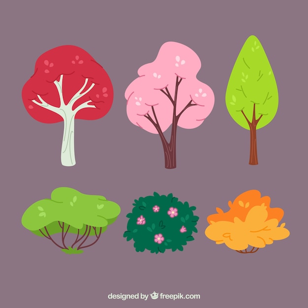 Premium Vector | Set of hand drawn trees and plants of colors Premium Vector | Set of hand drawn trees and plants of colors