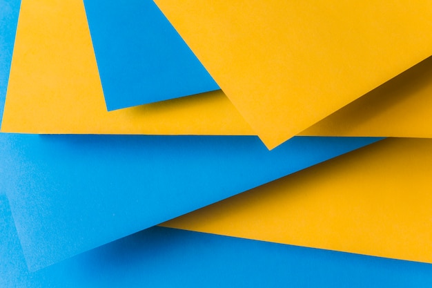 Papier Cartonné Jaune Et Bleu Superposés | Photo Gratuite Papier Cartonné Jaune Et Bleu Superposés | Photo Gratuite